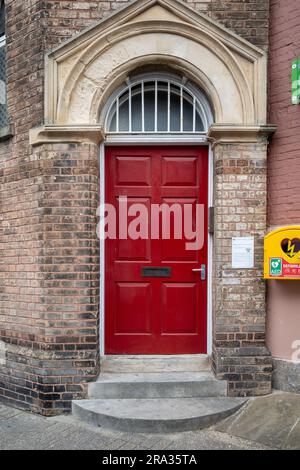 red traditional entrance door of a British house Stock Photo - Alamy