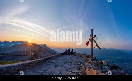 Innsbruck: summit cross on summit Hafelekarspitze, mountain range ...