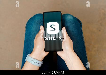In this photo illustration, the Shein logo is seen displayed on a ...