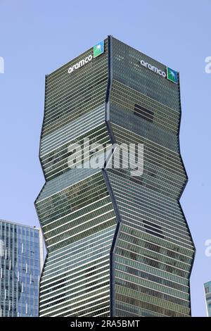 Saudi Aramco company logo in front of Saudi Arabia flag. December 5 ...