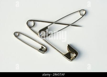 Safety pins, cut-out, object Stock Photo - Alamy