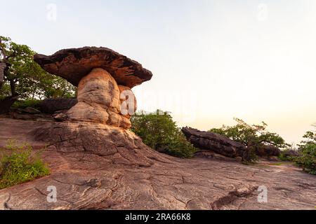 scenery sunrise at weird shaped rock. These stones have been ...