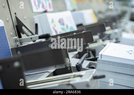Printing house printing process interior machines paper Stock Photo - Alamy