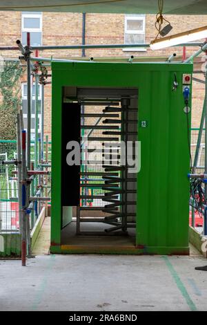 Turnstile Entrance to Construction Site Access Control Stock Photo - Alamy