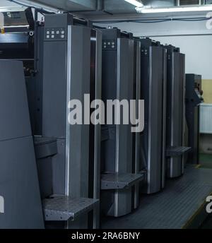 Printing house printing process interior machines paper Stock Photo - Alamy