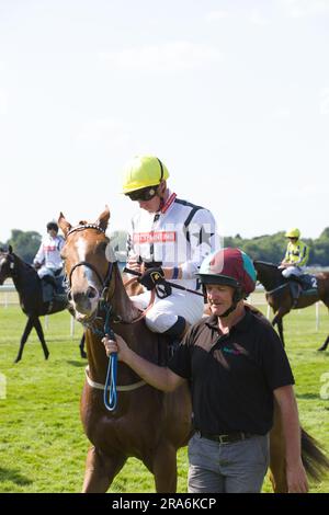 Jockey Sam James on Bellarchi at York Races Stock Photo - Alamy