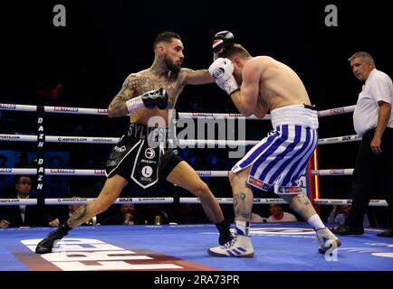 Adam Cope (left) and Lewis Sylvester in action during their English ...