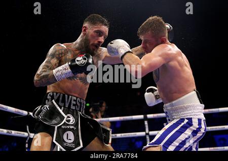 Adam Cope (left) and Lewis Sylvester in action during their English ...