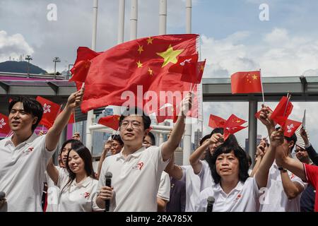 Numerous current and former government officials attend the flag rising ...