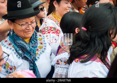 Indigenous Kichwa women dancing with traditional clothing during a ...