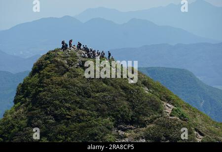 Tanigawa-Dake and climbers Stock Photo - Alamy