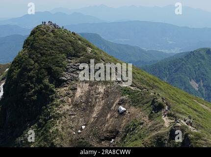 Tanigawa-Dake and climbers Stock Photo - Alamy