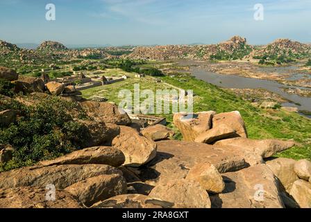 Different shapes rocks and Tungabhadra River at Anegundi in Hampi ...