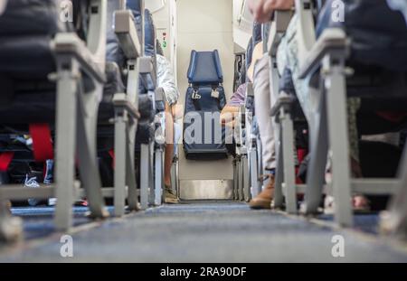 Normal class passenger jet airliner corridor. Ground view Stock Photo ...