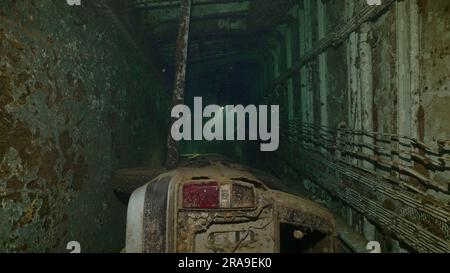 Scuba diver swim above car lying inside cramped hold of ferry Salem ...