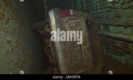 Car lying inside cramped hold of ferry Salem Express shipwreck, Red sea ...