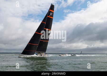 Notorious a Maxi 72 Racing Yacht powers up the Solent with chase boats ...