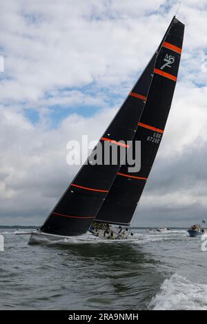 Notorious a Maxi 72 Racing Yacht powers up the Solent with chase boats ...