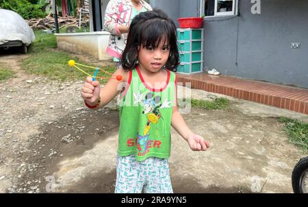 Children playing Lato Lato in Philippines, the trending toy that craze ...