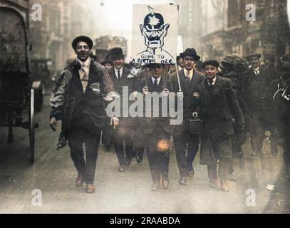 An Armistice Day scene in London on 11th November 1918 with a group of ...