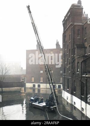 Ladder drill at LFB Southwark HQ. Date: early 20th century Stock Photo ...