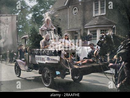 The Queen of the Carnival, dressed up to look like Cleopatra, riding ...