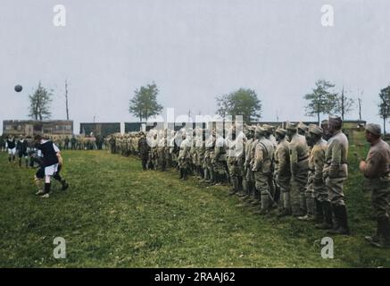 British and French soldiers playing and watching football on the ...