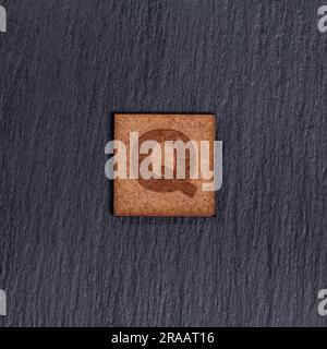 Capital Letter In Square Wooden Tiles - Letter J, On Black Stone ...
