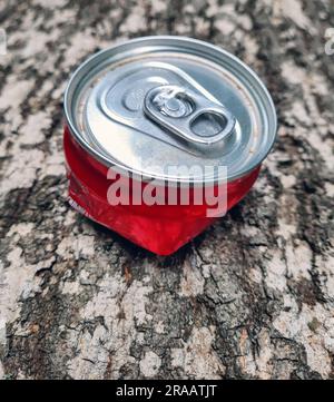 Crushed aluminum can from carbonated drink. Food packaging waste ...