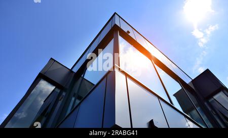 Graphite facade and large windows on a fragment of an office building ...