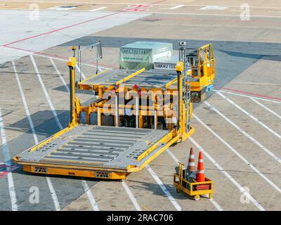 Aircraft container and pallet loader at the airport apron Stock Photo ...