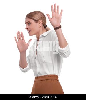 Beautiful emotional businesswoman avoiding something on white ...