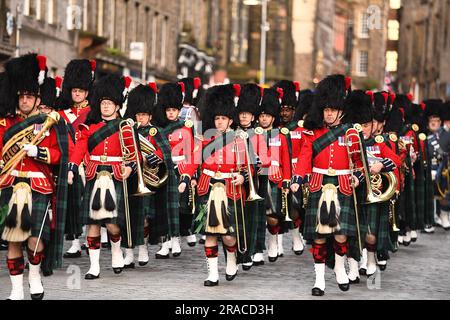 An early morning procession rehearsal takes place along the Royal Mile ...