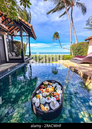 Floating breakfast in pool in Lamai beach resort in Koh Samui, Thailand ...