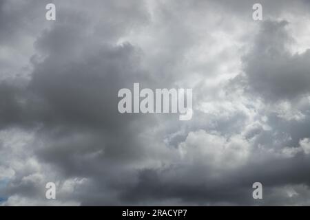 Dramatic background caused by dark clouds in the sky. Forecast of rain ...