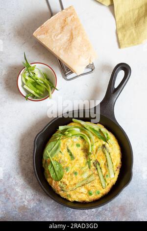 Fried omelette with vegetables and spring onions Stock Photo - Alamy