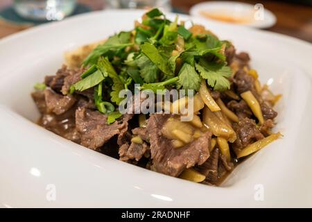 Typical Khmer stir fry dish of ginger with beef, known as Chha kh’nhei ...