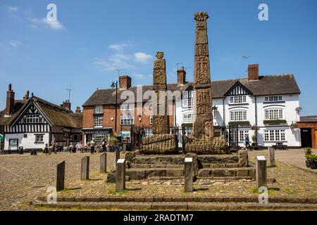 The ancient Saxon crosses in the cobbled market square of the Cheshire ...