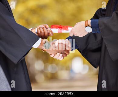 Giving, diploma and people handshake in graduation success ...