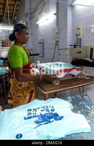 Manual fusing after printing in a garment industry, Tiruppur Tirupur ...