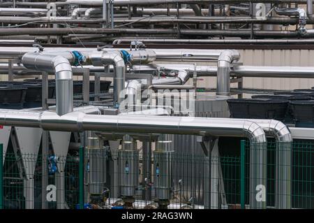 Equipment, cables and pipelines outside a modern cheese factory in ...