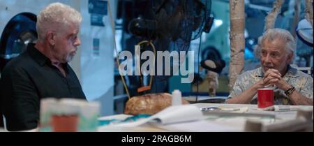 THE BAKER, from left: Ron Perlman, Emma Ho, 2022. © Falling Forward ...