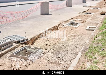 Connecting a trench drain to a concrete manhole structure at ...