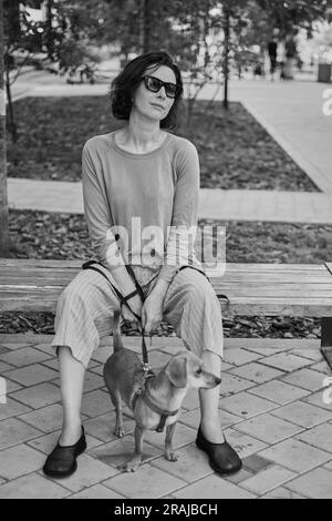 Photo of pretty adorable young lady dressed white t-shirt smiling ...