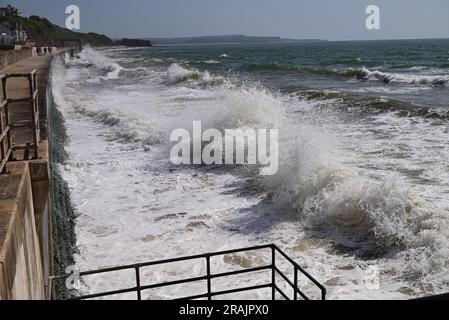 Waves and railings along the seawall at Dawlish, South Devon Stock ...