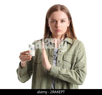 Young female junkie rejecting drugs on white background Stock Photo - Alamy