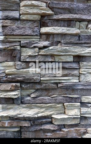 Wall stonework finishing from soft color natural stone trim as ...