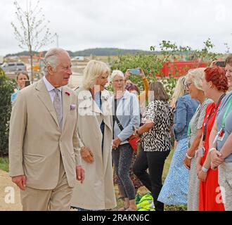 King Charles III and Queen Camilla with Brough Scott (right) arrive by ...