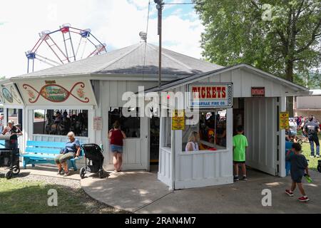 Ferris Wheel carnival rides seen from above, view from LIRR elevated ...