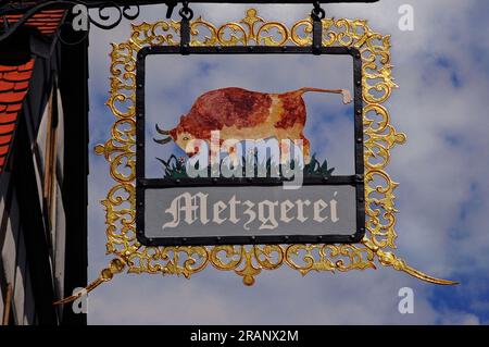 Gilded metal sign for a butcher’s shop in Rothenburg ob der Tauber ...